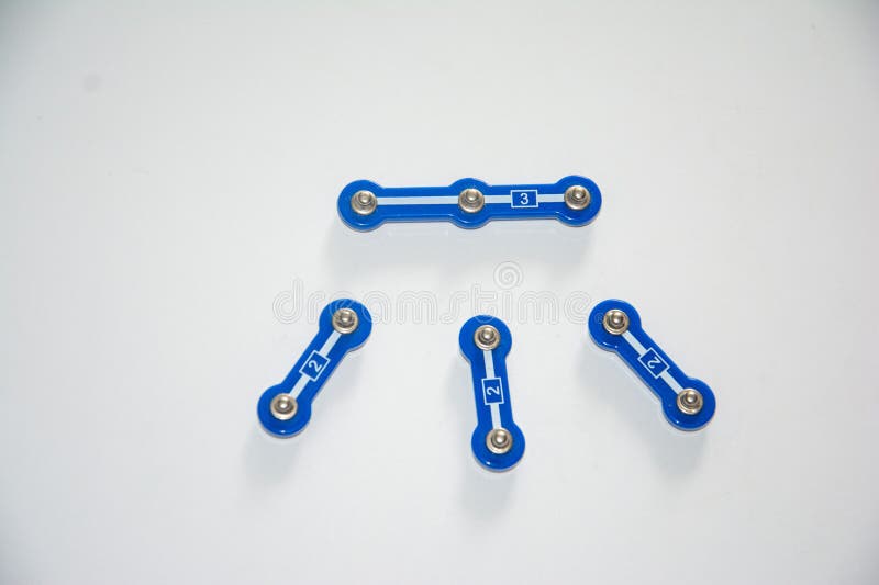 Four Blue Plastic Electronic Connectors, Metal Rivets, Arranged in a ...