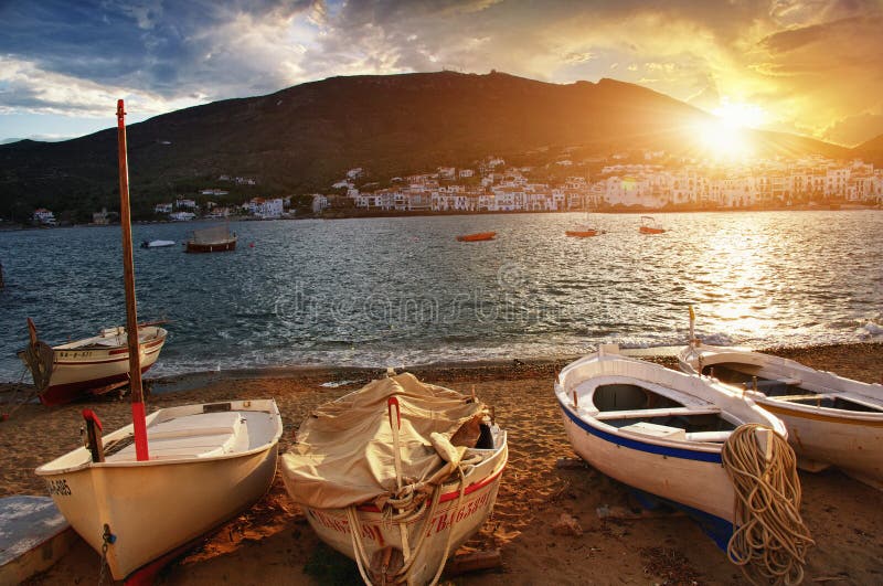 Four boats on a sand stock image. Image of light, fisherman - 27205489