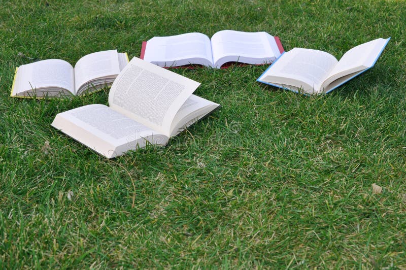 Stack of Books on Green Grass Stock Image - Image of summer, concepts ...