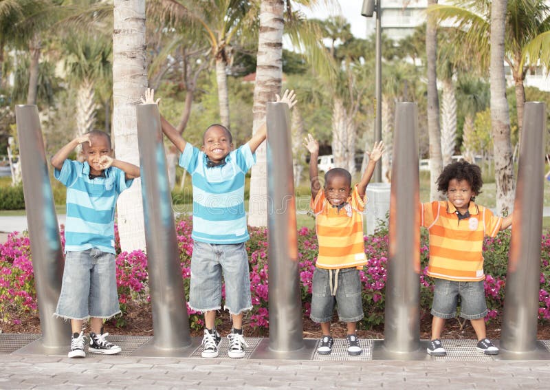 Four brothers in the park stock image. Image of matching - 14221929
