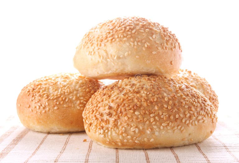 Four Buns with Sesame Seeds Stock Image - Image of meal, striped: 13204209
