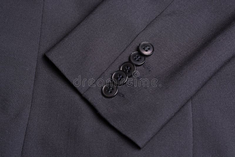 Four Buttons on a Black Business Jacket Sleeve Stock Photo - Image of ...