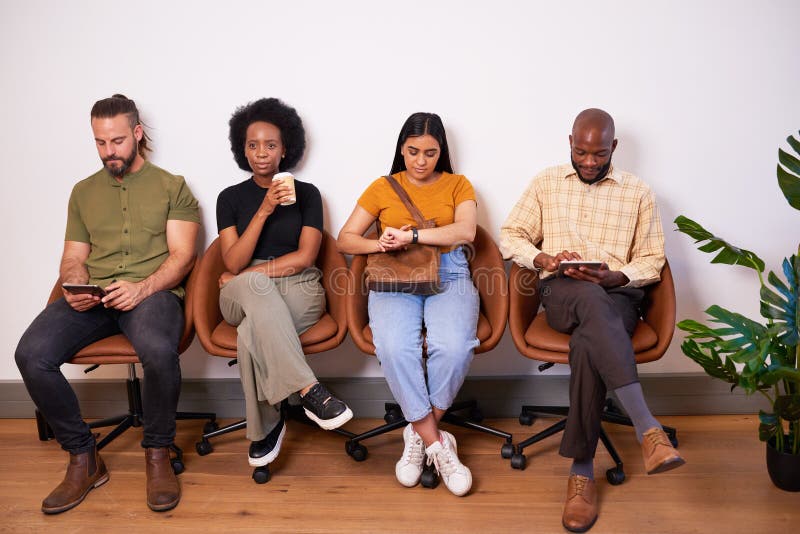 Four Candidates Sitting in a Row Waiting for Job Interview, Creative ...