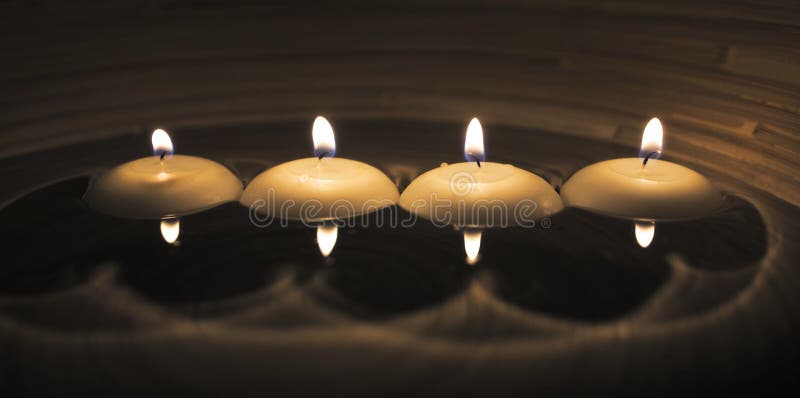 Four candles stock image. Image of decorative, love, glare - 62061703