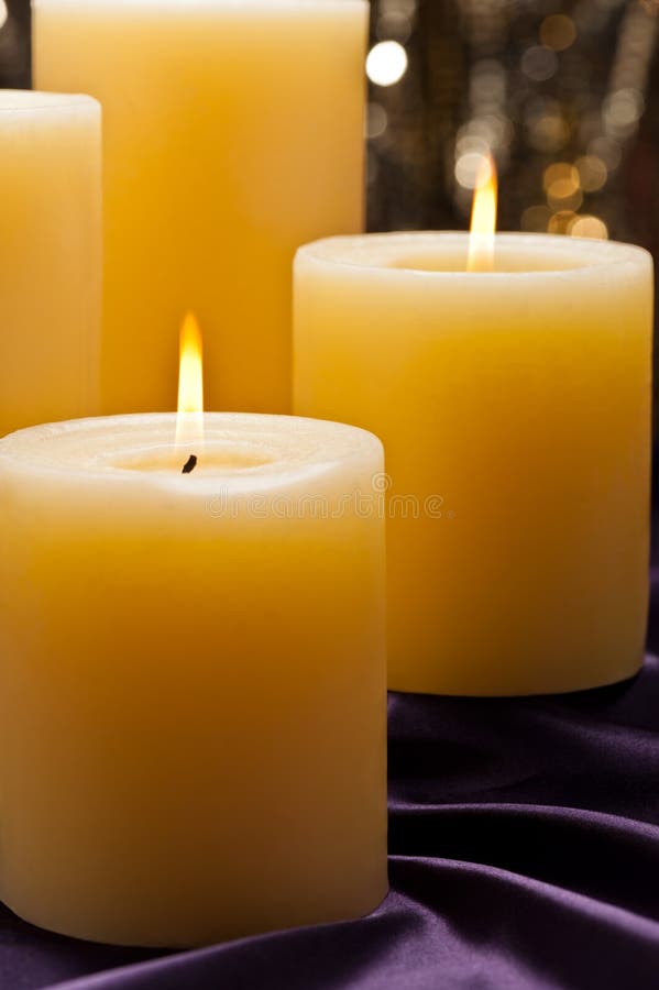 Four Candles Over Purple Velvet Stock Image - Image of advent, love ...