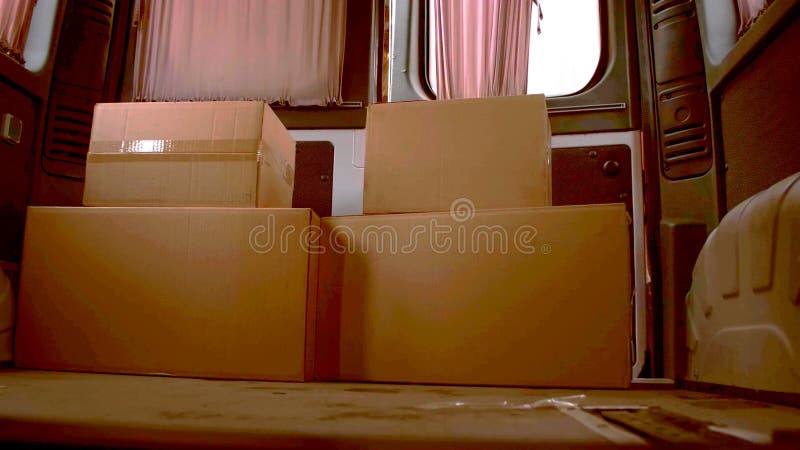 Four Carton Boxes in the Back of a Van Stock Photo - Image of carton ...