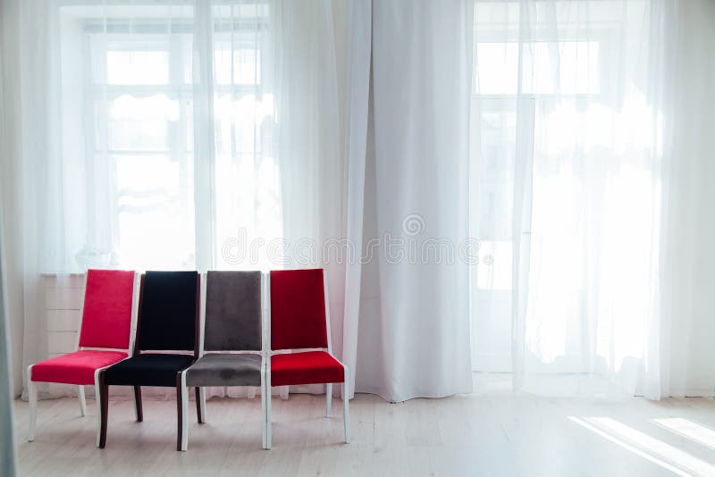 Four Chairs in the Interior of an Empty White Room Stock Photo - Image ...