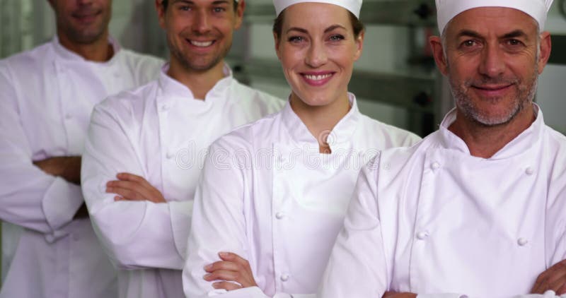 Four Cheerful Chefs Looking at Camera with Arms Crossed Stock Footage ...