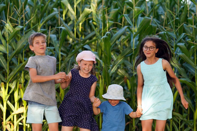 Children Have Fun on the Seashore, Splashes in All Directions. Happy ...