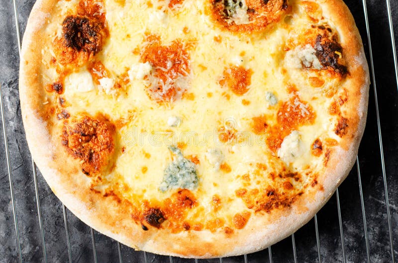 Four Cheese Pizza on Dark Background, Freshly Baked Pizza Stock Photo ...
