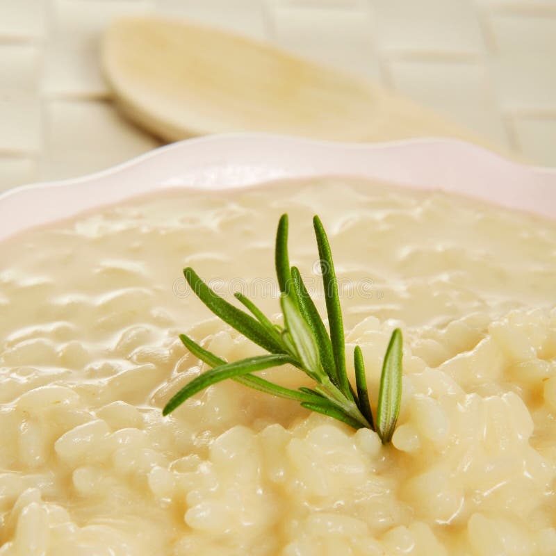 Cheese Risotto and Parmesan Flakes in White Bow Stock Image - Image of ...