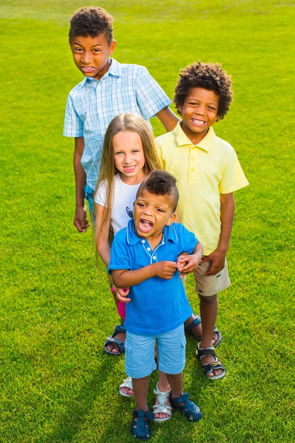 Four Children on the Glade. Stock Photo - Image of garden, colorful ...