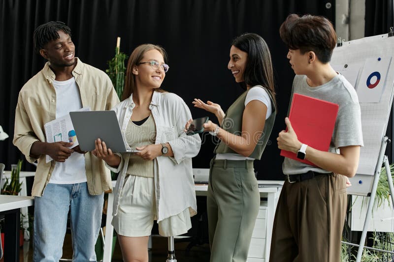 Four Colleagues Brainstorm in an Office Stock Photo - Image of ...