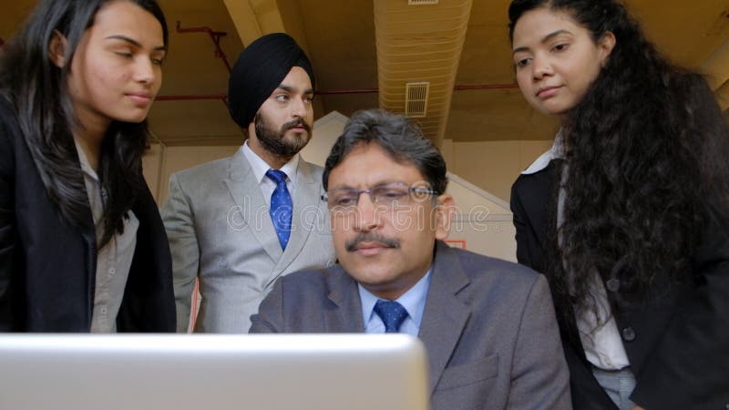 Four Colleagues from India Working Together in the Office Stock Image ...
