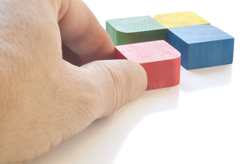 Four Colored Cubes Hand Stock Photos - Free & Royalty-Free Stock Photos ...