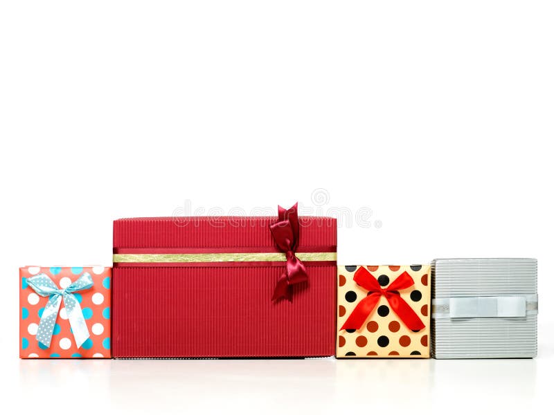 Four Colorful Presents in a Row Stock Photo - Image of package ...