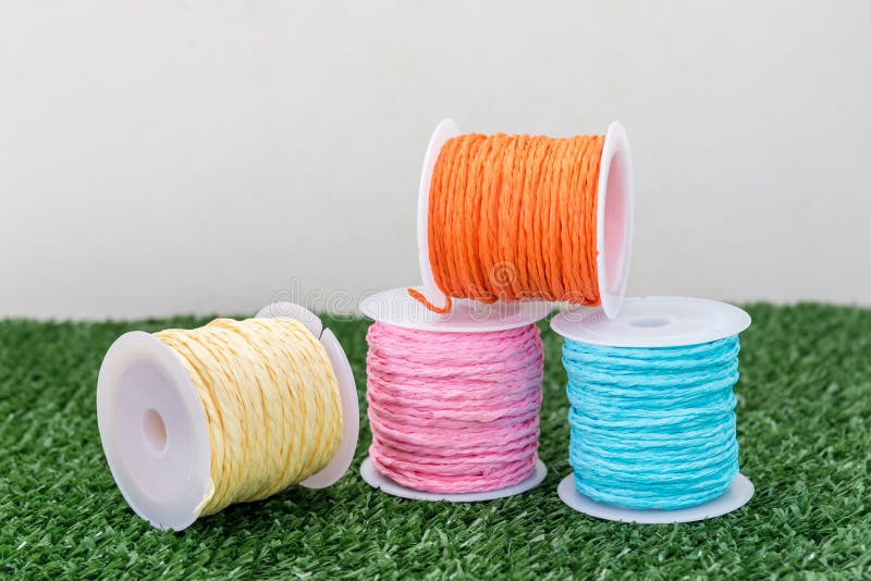 Four of Colorful Thread on Grass with White Background Stock Image ...