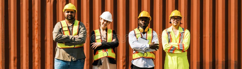 Four Construction Workers Stand Confidently in Front of a Container ...