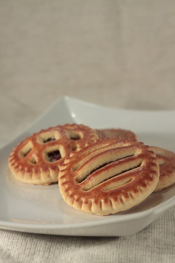 Four cookies on a plate stock photo. Image of plate, desert - 39768796