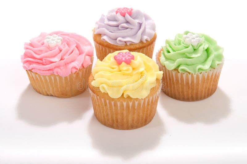 Four Cupcakes stock image. Image of white, pastel, green - 18666189