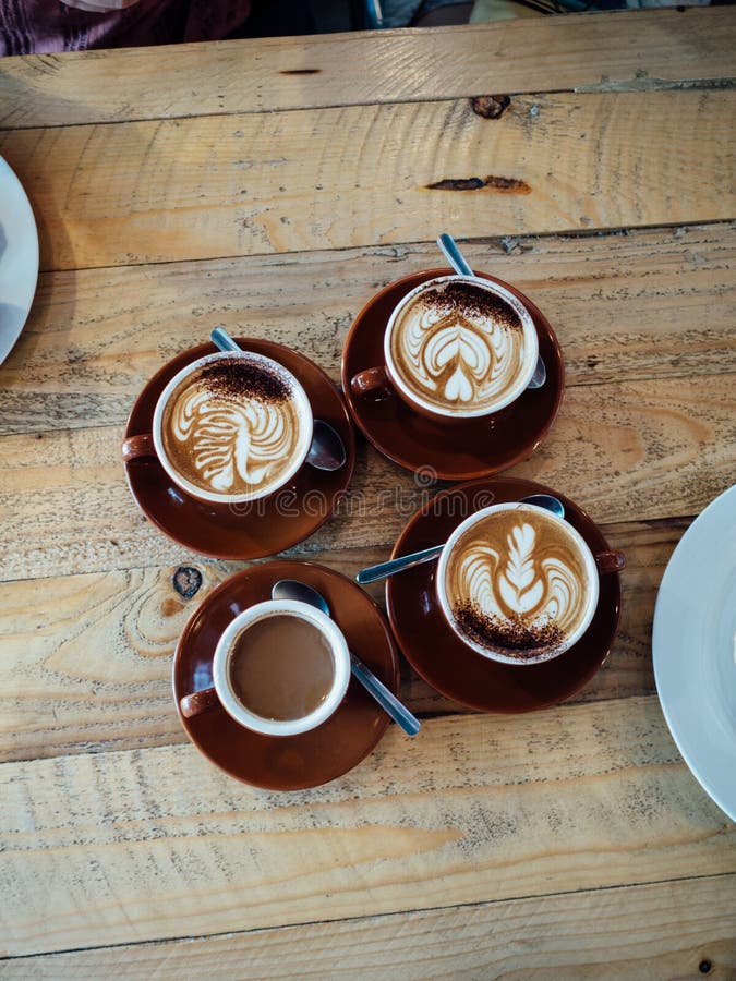 Four cups of coffee stock photo. Image of four, friends - 70395314