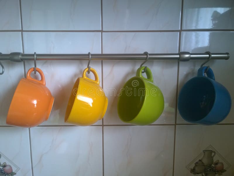 Four cups stock image. Image of green, four, blue, colors - 102076201