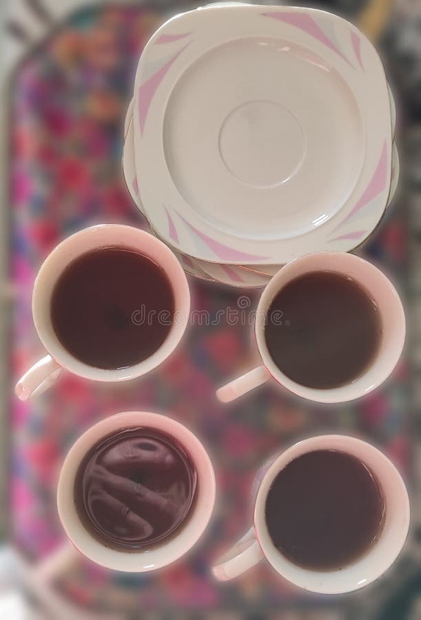 Four Cups of Tea and Saucers Stock Image - Image of restaurant, handle ...
