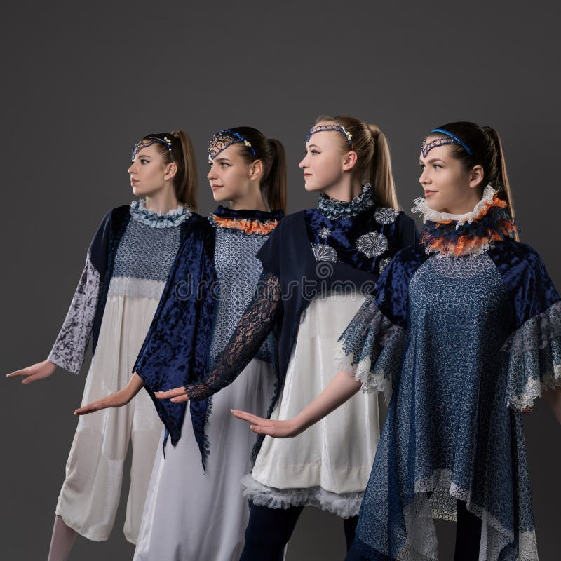 Dancers in Elegant Costumes Performing a Contemporary Routine in Studio ...