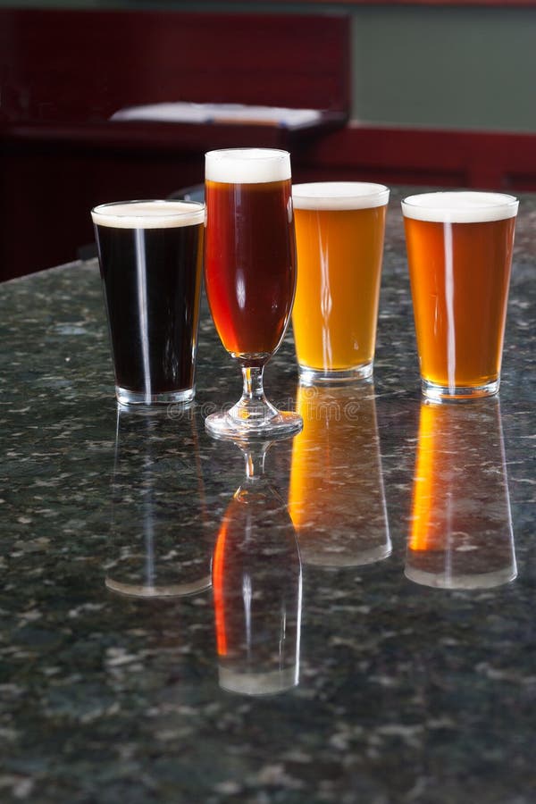 Four different beers stock image. Image of brew, thirst - 40804771