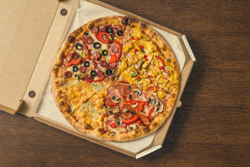Four Different Parts of Pizza with Knife on the Wooden Table Stock ...