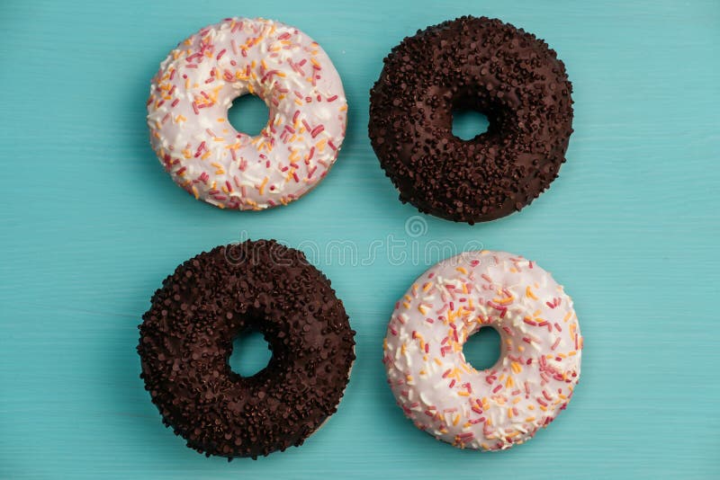 Four Donuts in Box on White Background Stock Photo - Image of differant ...