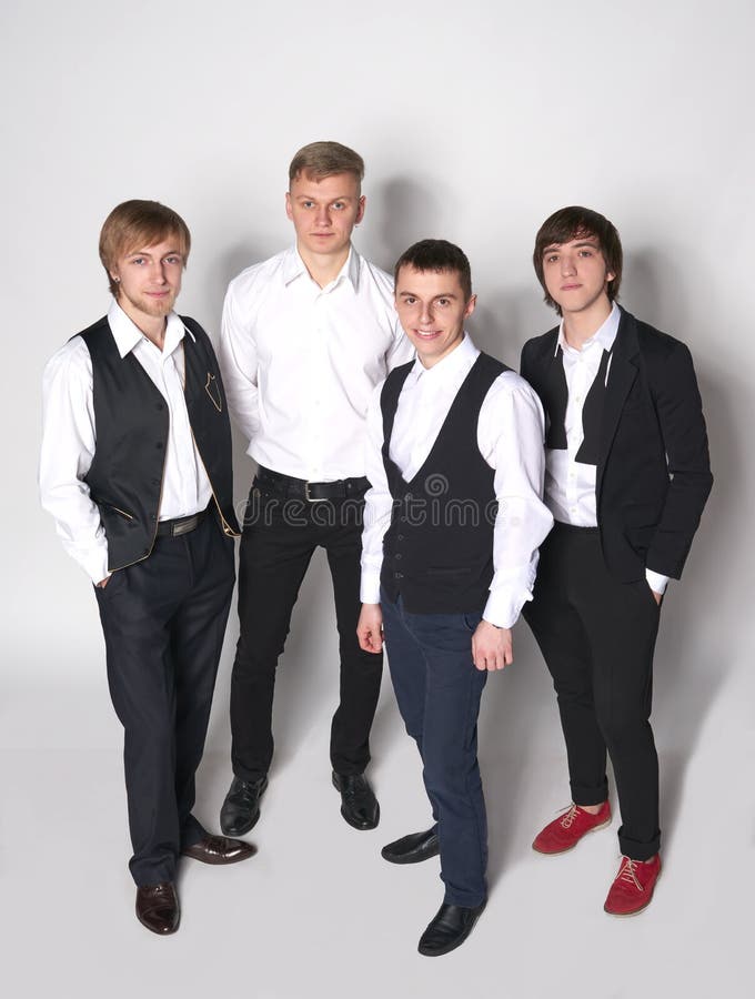 Four elegant young men stock photo. Image of partners - 51230338