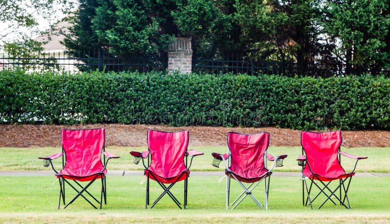 Four Empty Red Chairs stock image. Image of furniture - 74230165