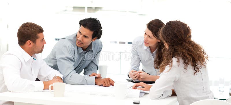 Four Engineers Discussing about a New Project Stock Image - Image of ...