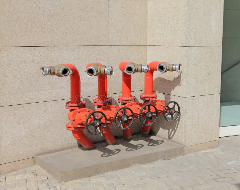 Four Fire Hydrant in Front of the Building. Stock Image - Image of ...