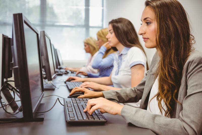 Four Focused Women Working Computer Room Stock Photos - Free & Royalty ...