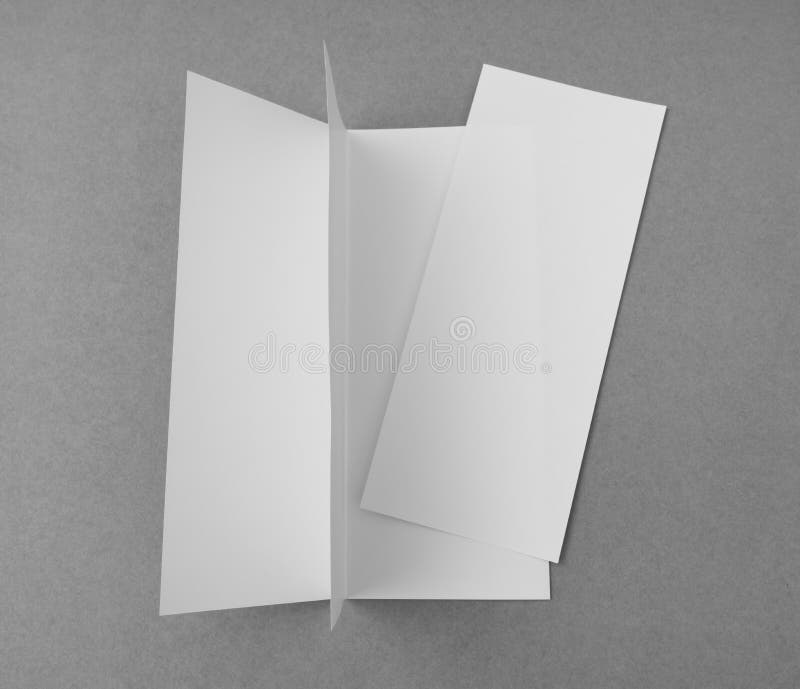 Four - Fold White Template Paper on Wood Texture . Stock Photo - Image ...