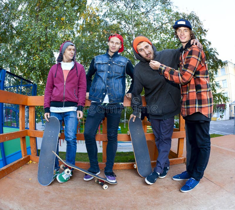 Four friend in skatepark stock image. Image of outside - 28382719