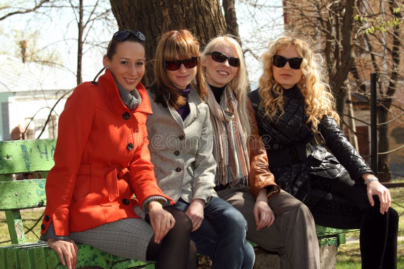 Four Friends stock photo. Image of bench, outdoor, sitting - 9334176