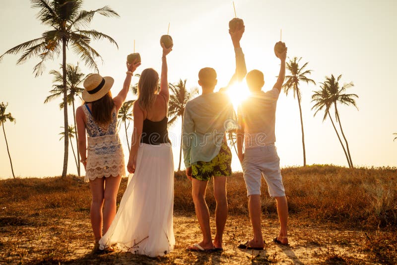 Four Friends Hands Up and Creers Vecation Stock Photo - Image of ...