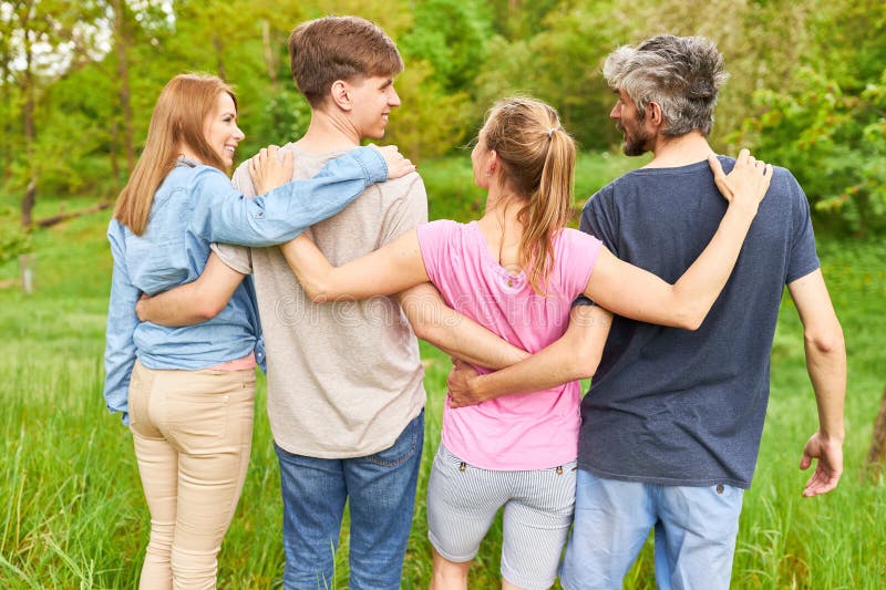 Four Friends Walk Side by Side in Nature Stock Photo - Image of ...