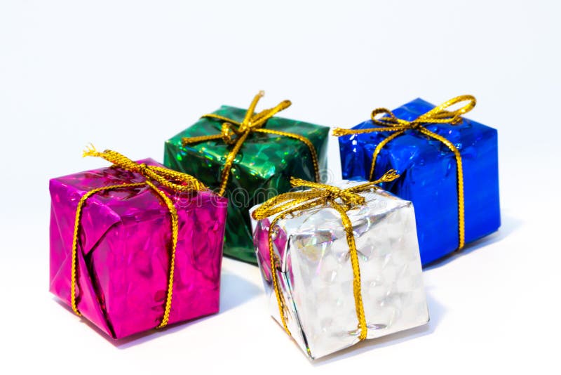 Four Gift Boxes with Golden Ribbon on White Stock Image - Image of ...