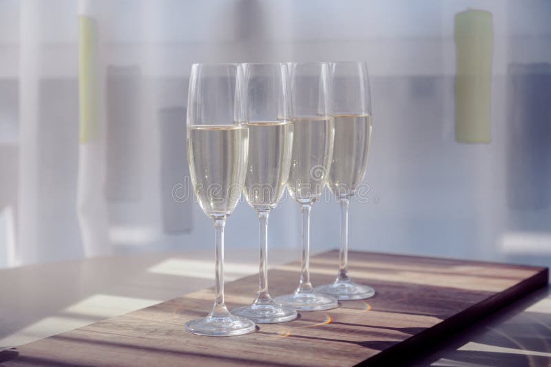 Four Glasses of White Wine on a Morning Table in Provence Stock Photo ...