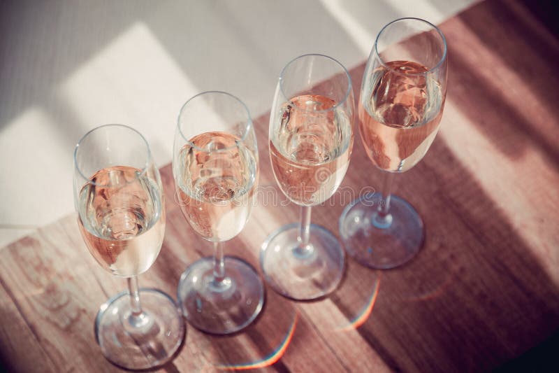 Four Glasses of White Wine on a Morning Table in Provence Stock Photo ...