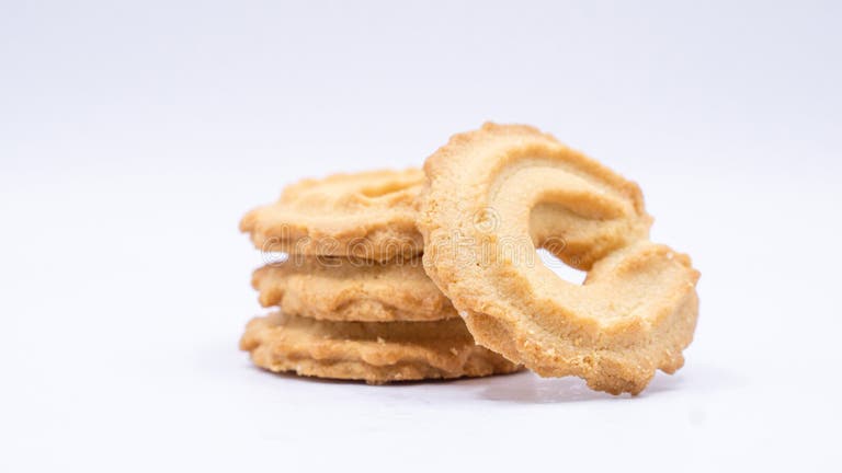 Four Golden Ring Cookies Stacked and Standing on White Stock Photo ...