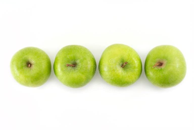 Four green apples in a row stock image. Image of dieting - 7363621