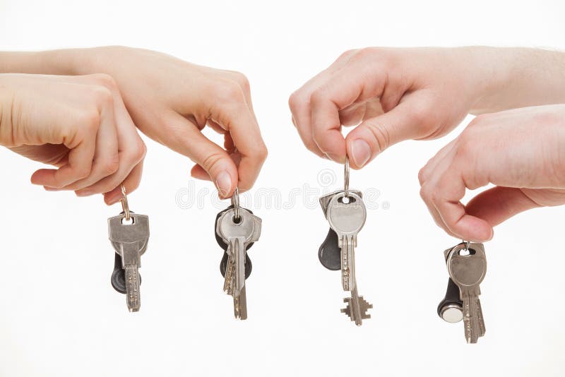 Four Hands Holding Bunches of Keys Stock Image - Image of finger, four ...