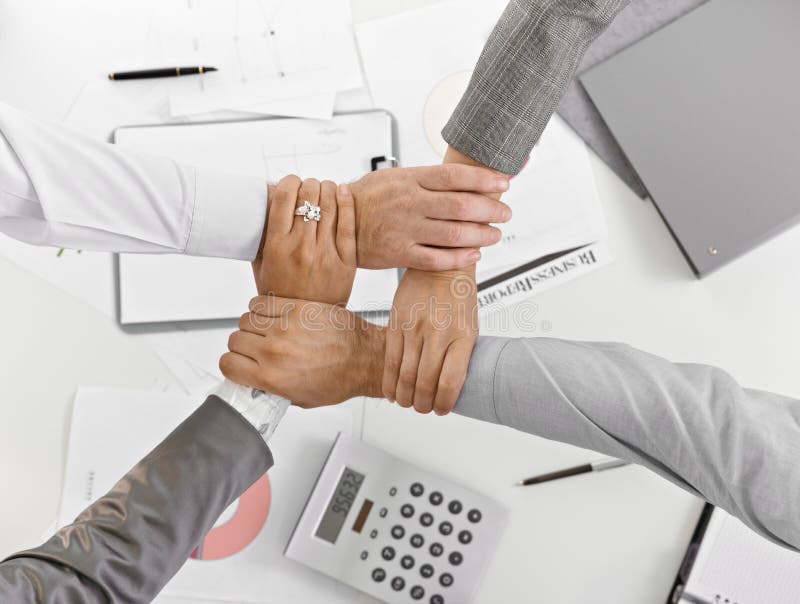 Four Hands Together in Unity at Businessmeeting Stock Image - Image of ...