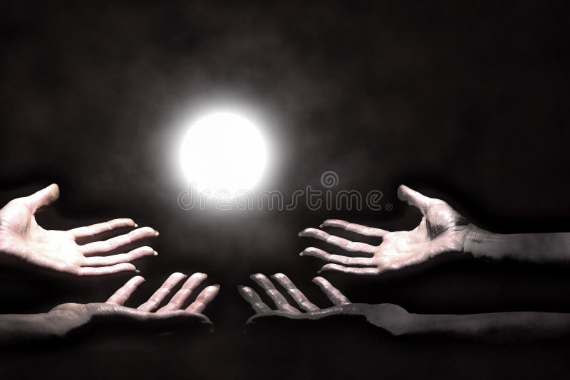 Four Hands Under the Sun Against a Dark Background 3 Stock Image ...