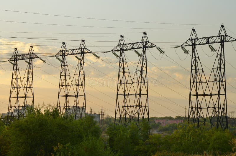 Four High-power Support on the Sunset Stock Image - Image of voltage ...